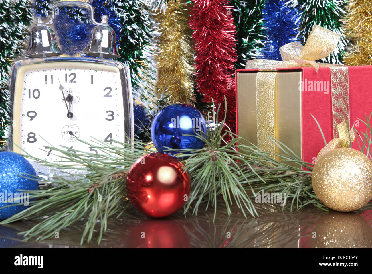 Colored balls , clock and gift boxes on christmas background Stock ...