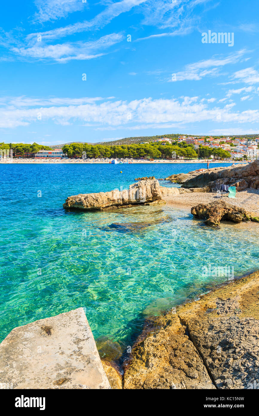 Small beach with rocks and turquoise sea water in Primosten town ...