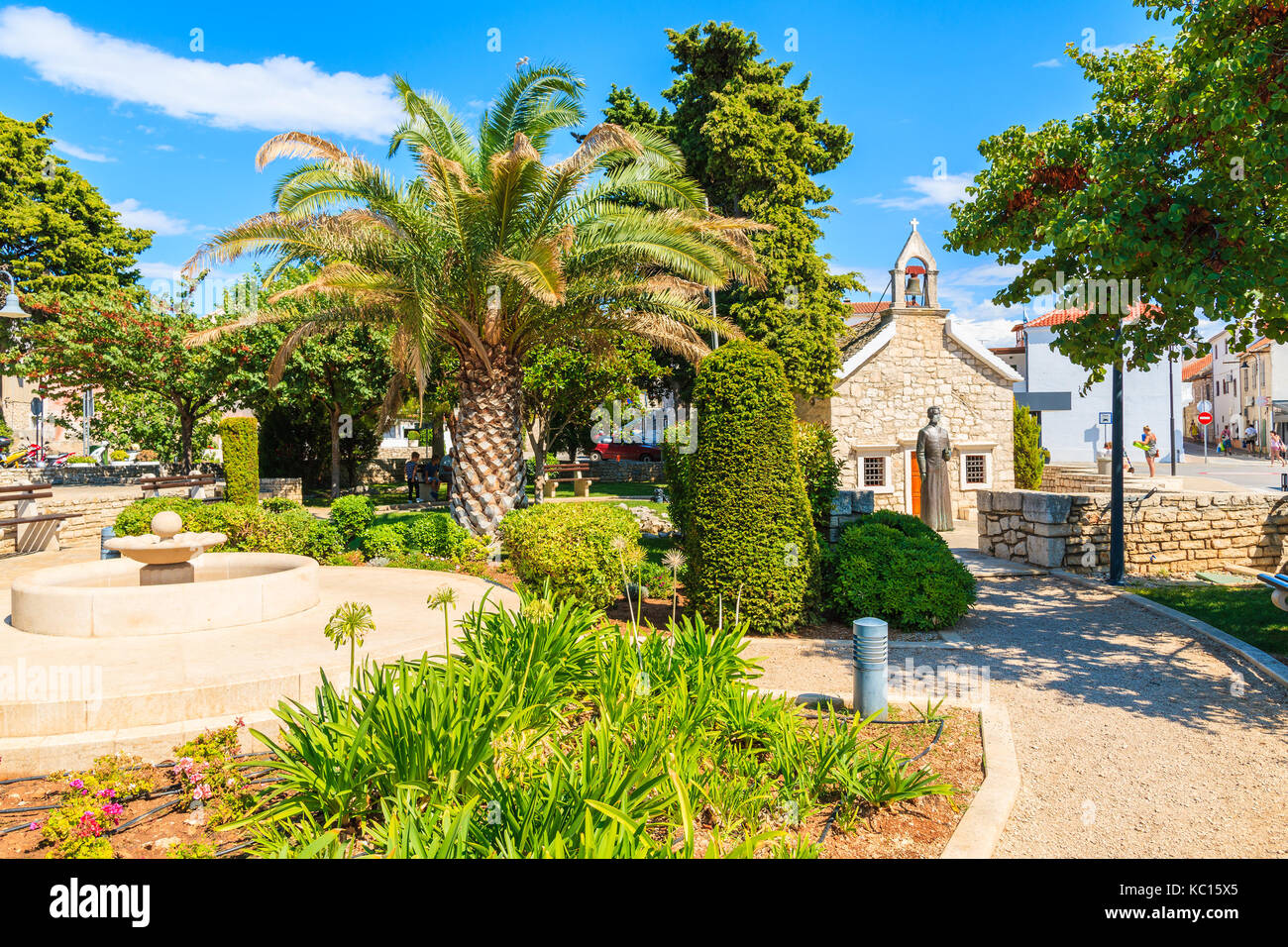 PRIMOSTEN TOWN, CROATIA - SEP , 2017: Green plants and small chapel in ...