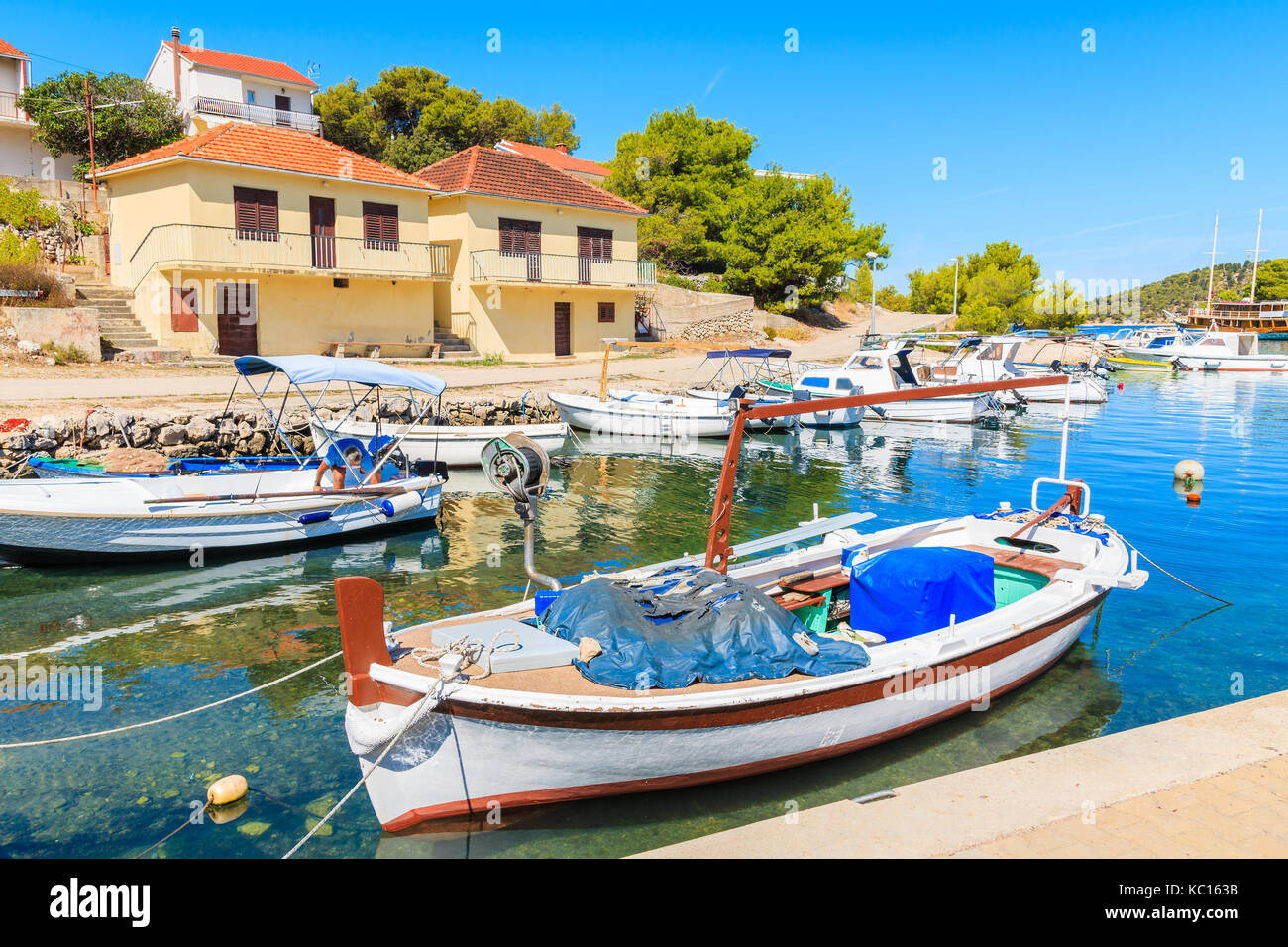Fishing boats anchoring in small port of Razanj, Dalmatia, Croatia ...
