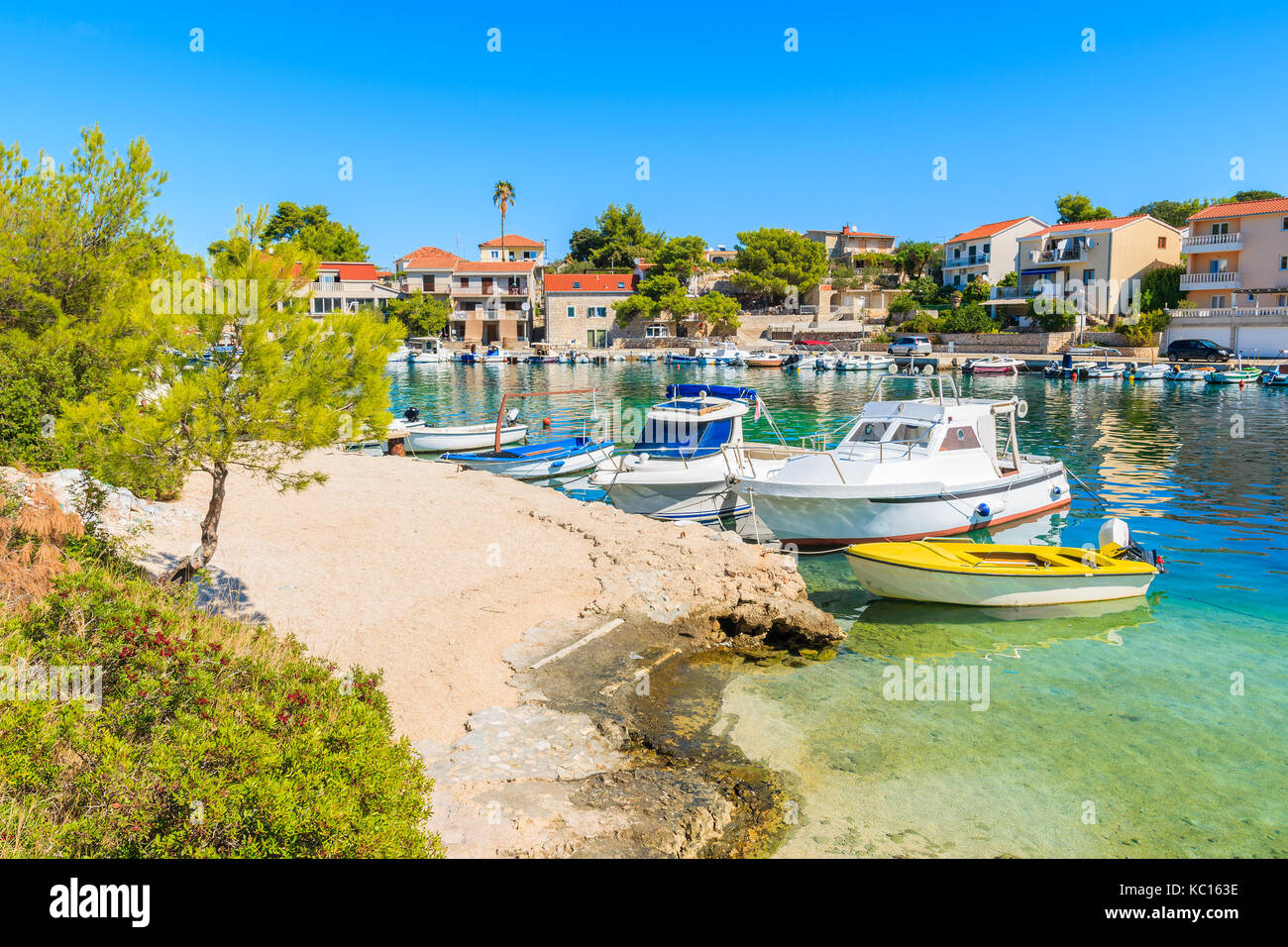 Boats anchoring in small port of Razanj, Dalmatia, Croatia Stock Photo ...