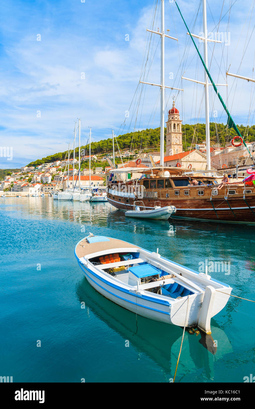 Fishing boat and wooden yacht in Pucisca port, Brac island, Croatia ...