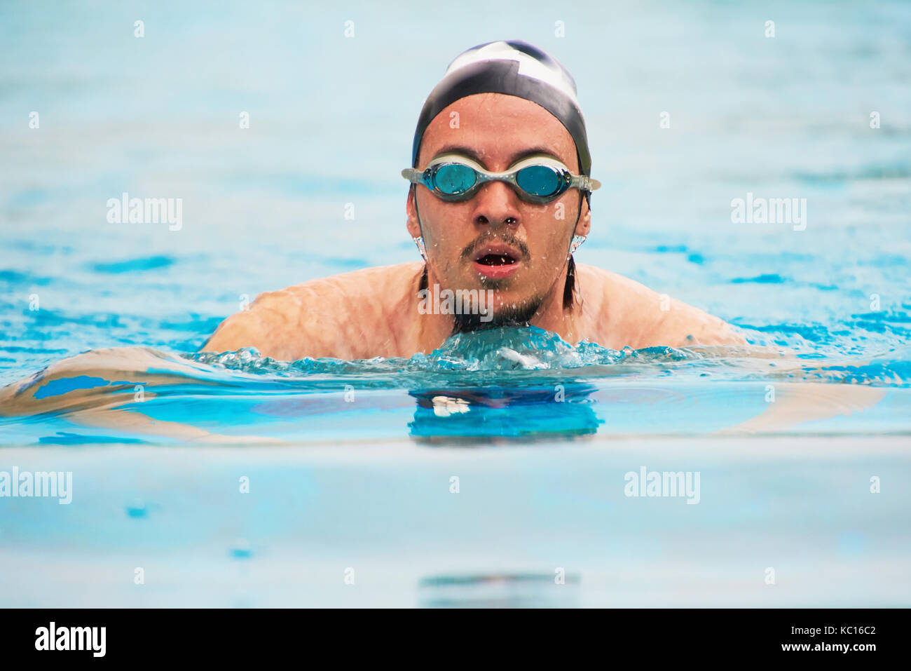 Young swimming sport man swin in pool. Man in swimming goggles Stock ...