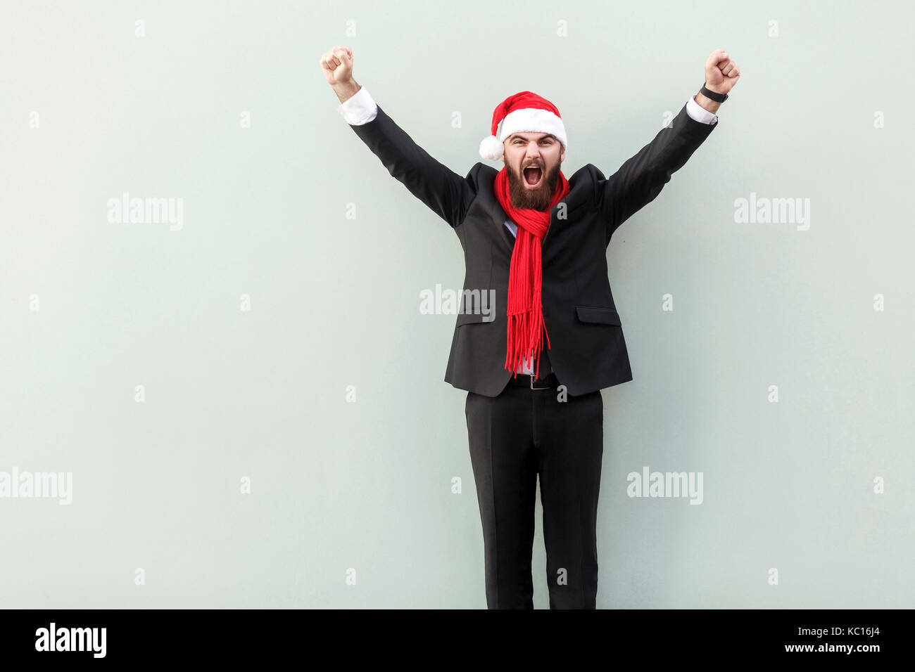 Win and success concept. Businessman rejoicing for his success ...