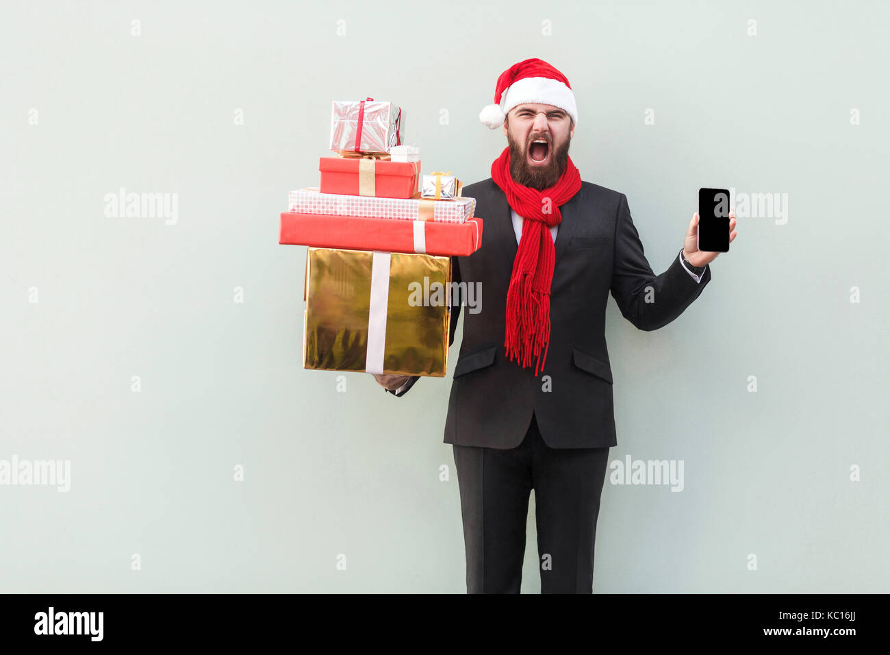 Santa holding gifts green screen hi-res stock photography and images ...