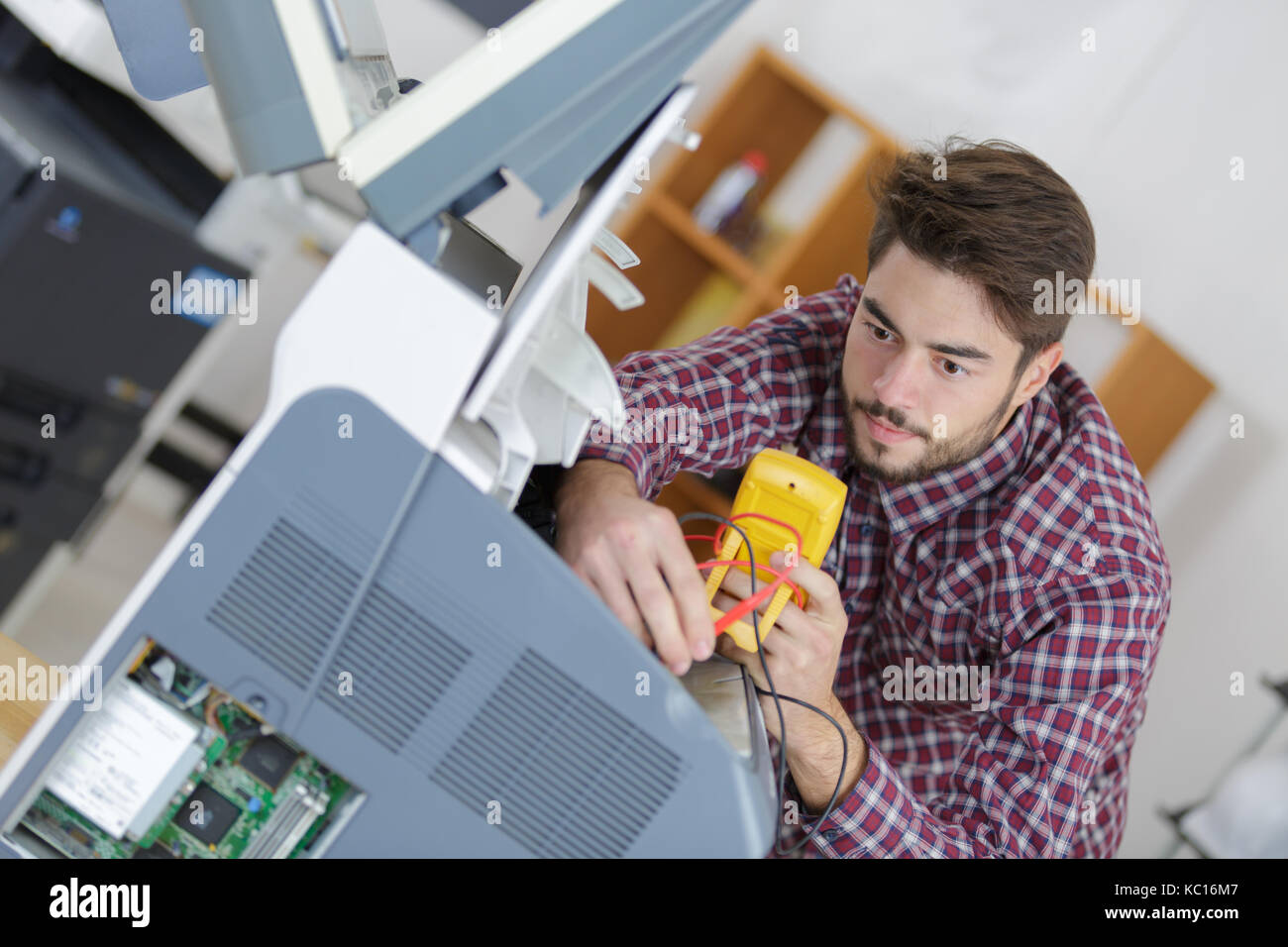 reading the volt reader Stock Photo - Alamy
