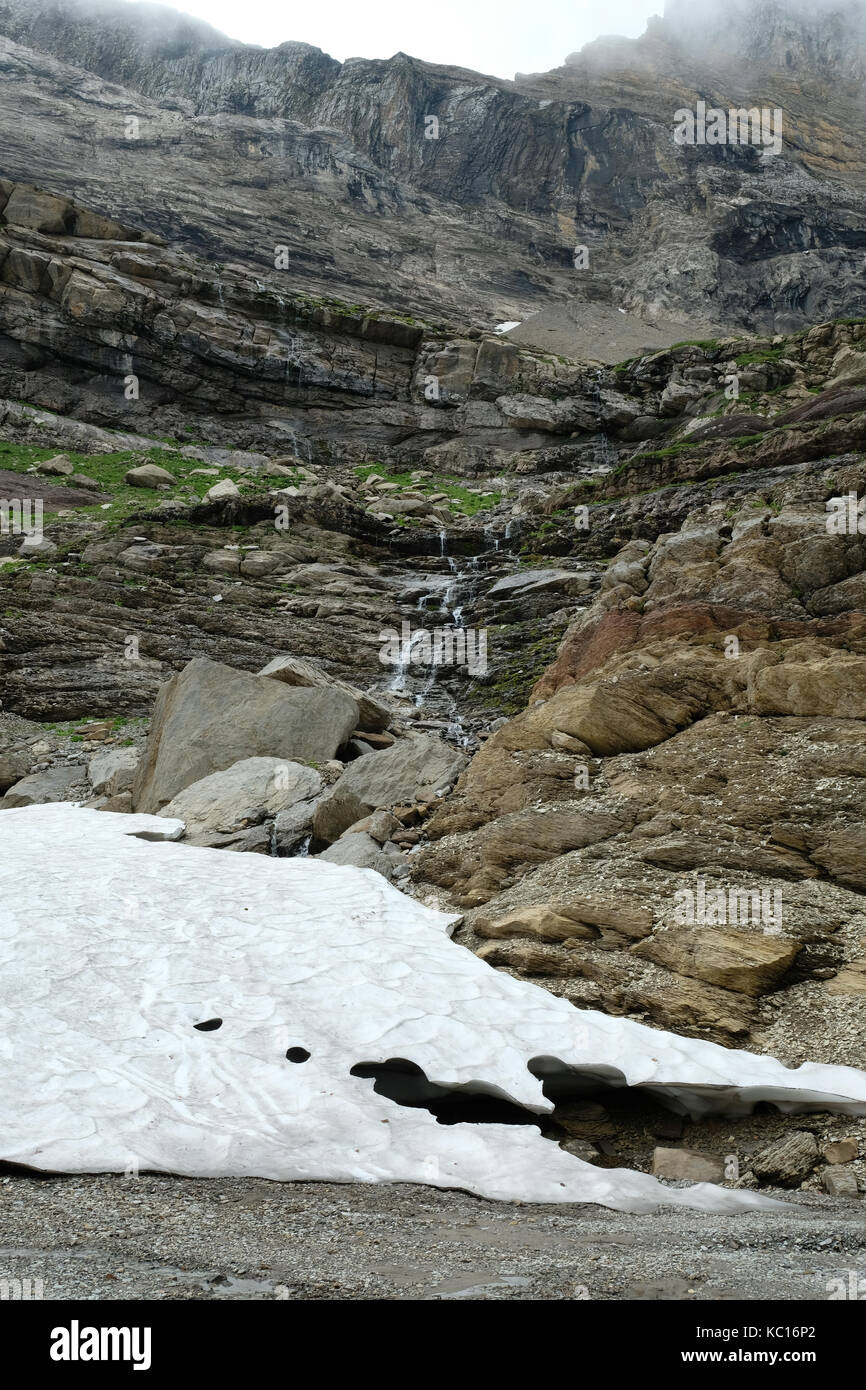 Glacial stream running down into the valley below the Col des Chambres ...