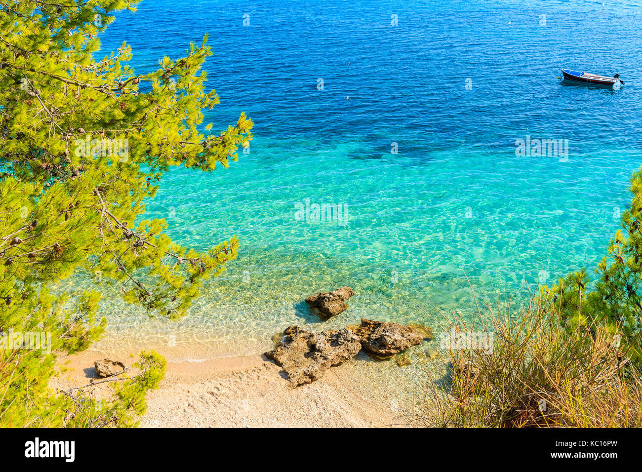 View of stunning beach with turquoise sea water in Bol town, Brac ...