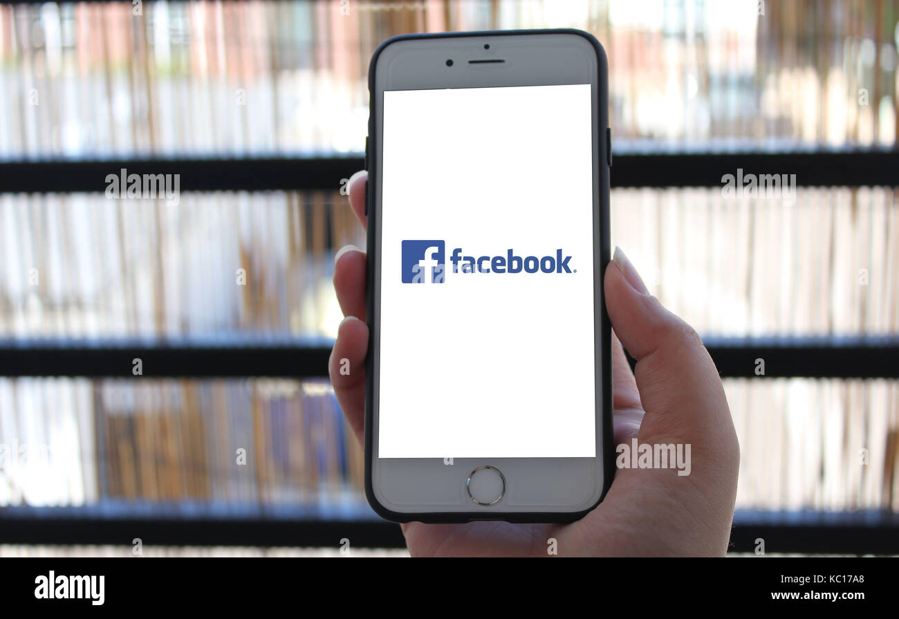 Facebook logo on phone Stock Photo - Alamy