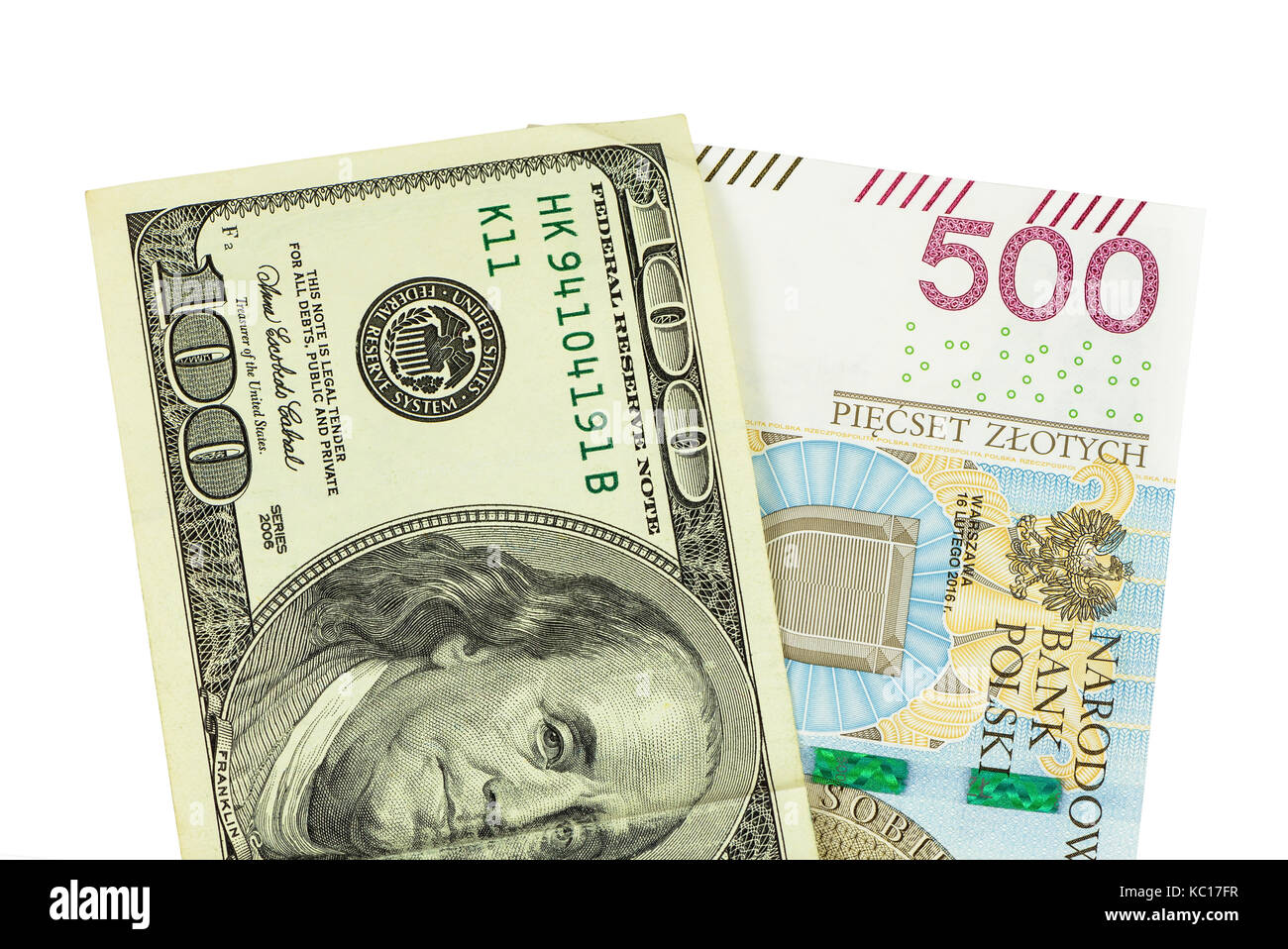 Banknotes of 100 USD and 500 PLN isolated on white background with ...