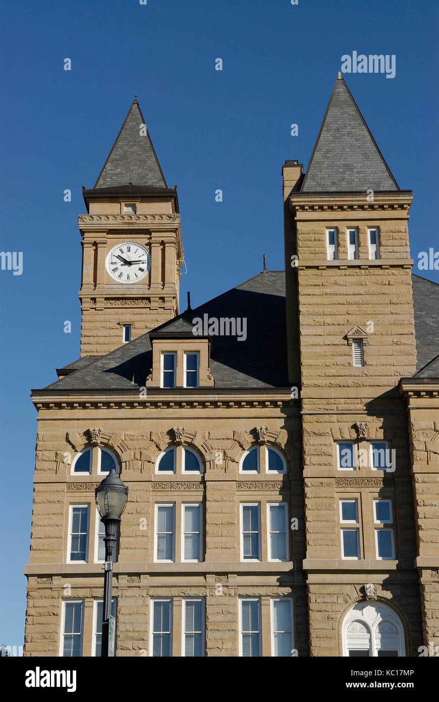 Courthouse with clock tower and blue sky Stock Photo - Alamy