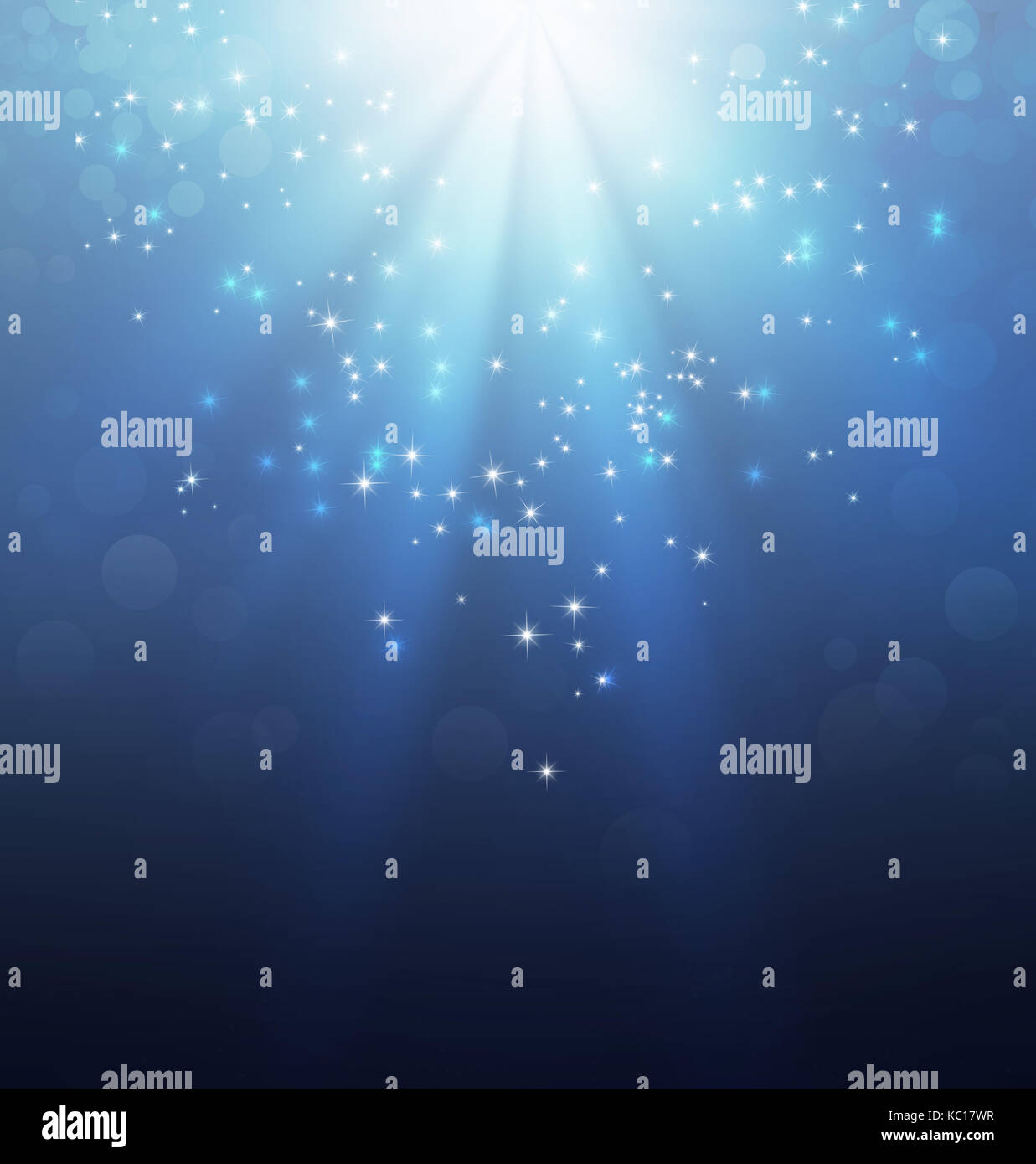Light down and stars falling on a festive blue background Stock Photo ...