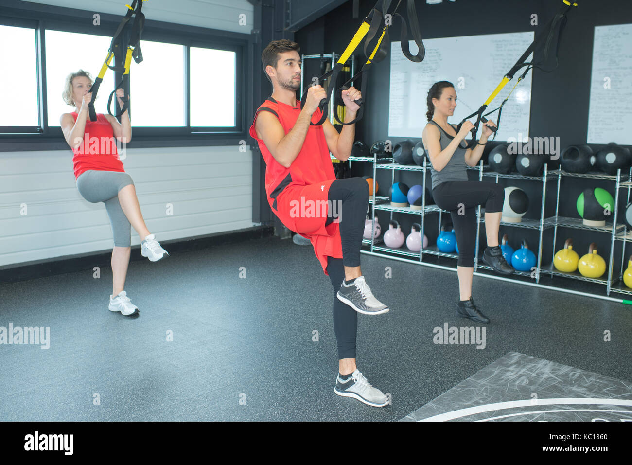group of people training at gym class Stock Photo - Alamy