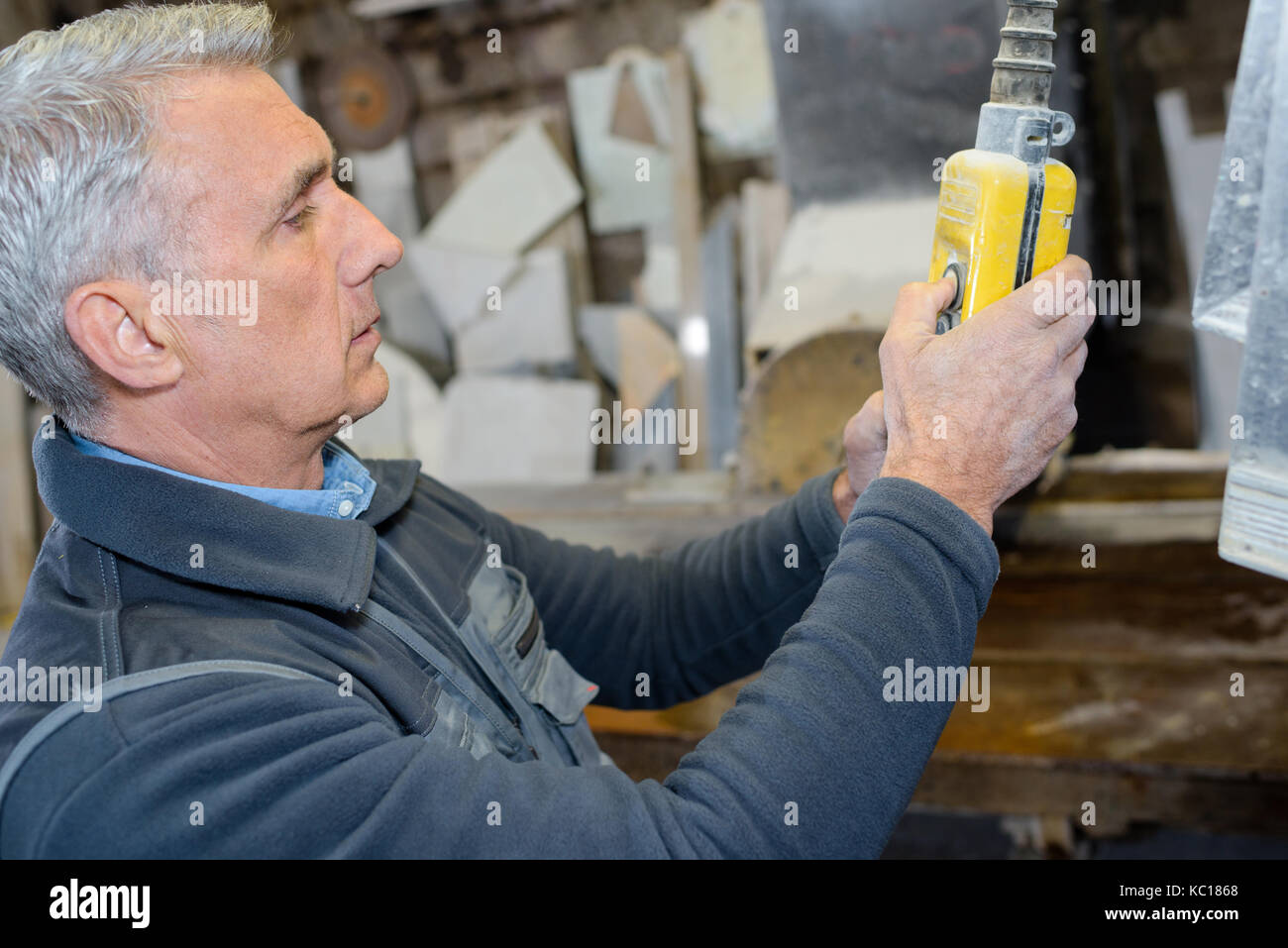 technician calibrates a machine in a factory Stock Photo - Alamy