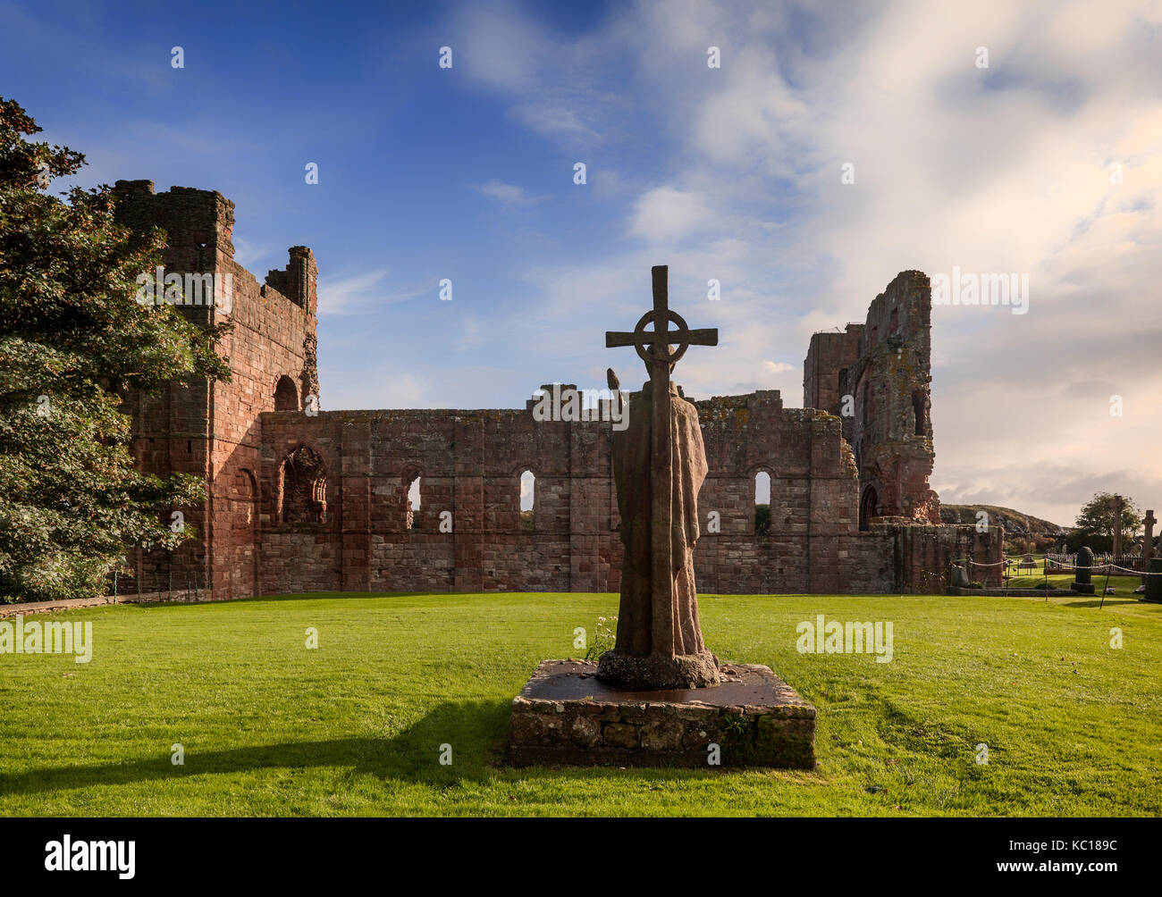 St Cuthbert's statue next the ruins of the church, built about 1150, on ...