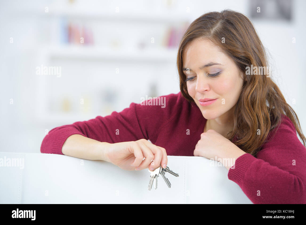 happy young woman with keys Stock Photo - Alamy