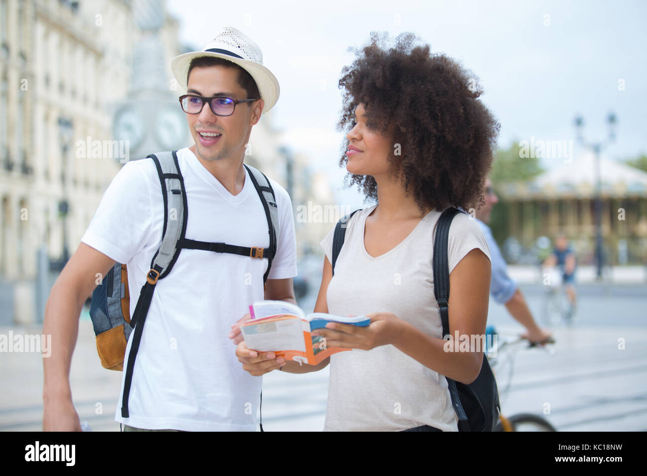 young beautiful happy romantic couple lost in a city Stock Photo - Alamy