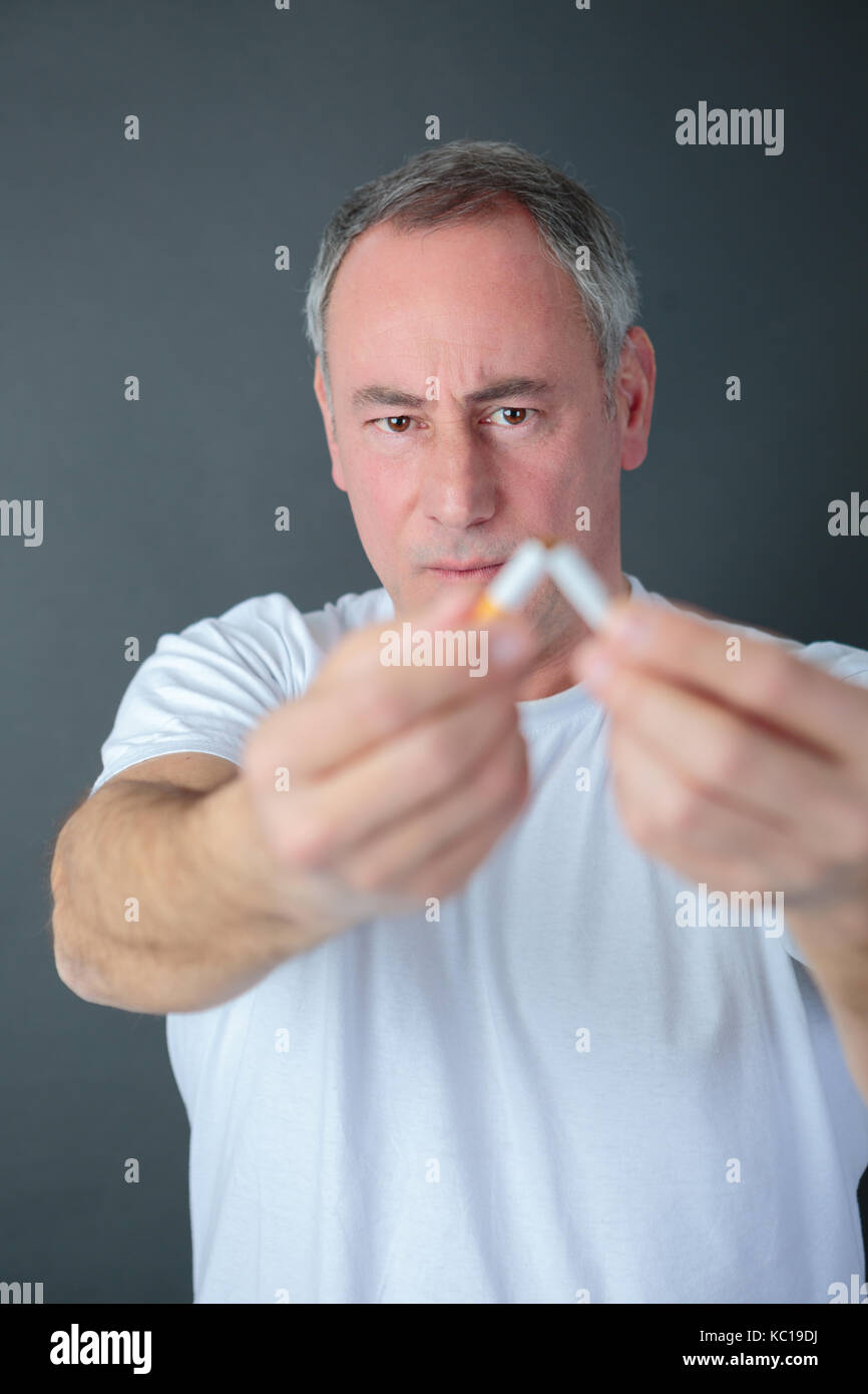 Smoking hand gesture hi-res stock photography and images - Alamy