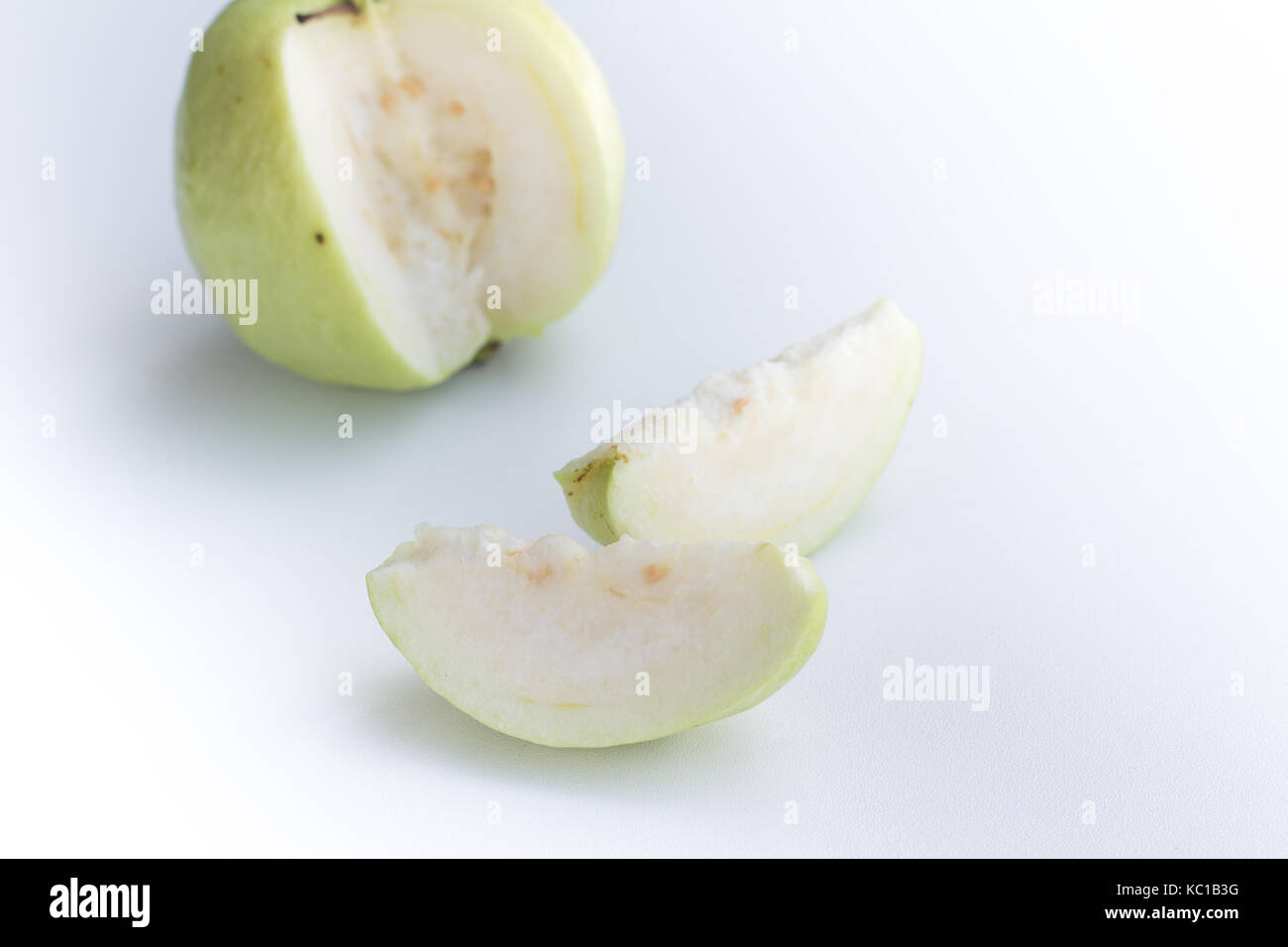 fresh guava with stem on white background(selective focus Stock Photo ...