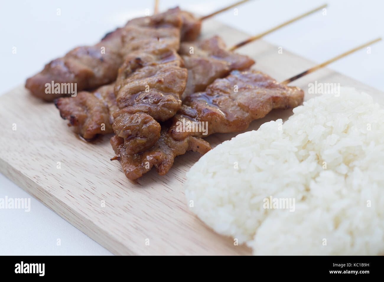 Grilled pork in asian style sticky rice that in Thailand is famous food ...
