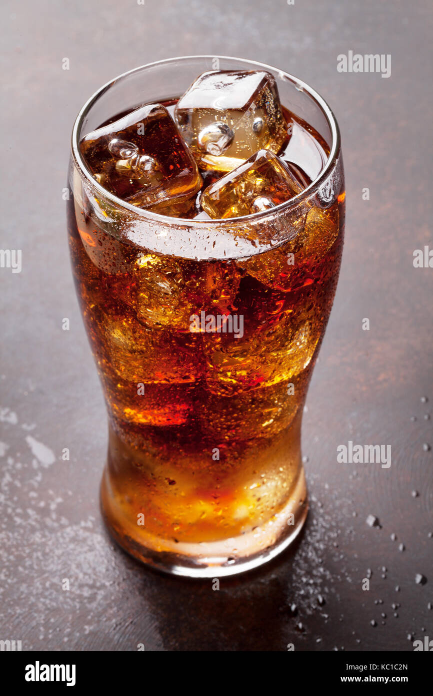 Cola glass with ice cubes Stock Photo - Alamy