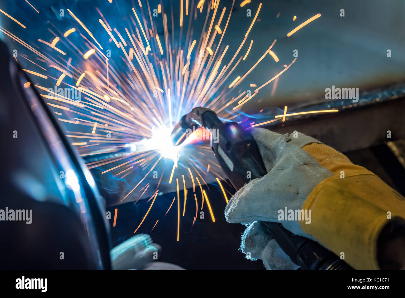 welder, craftsman, erecting technical steel Industrial steel welder in ...