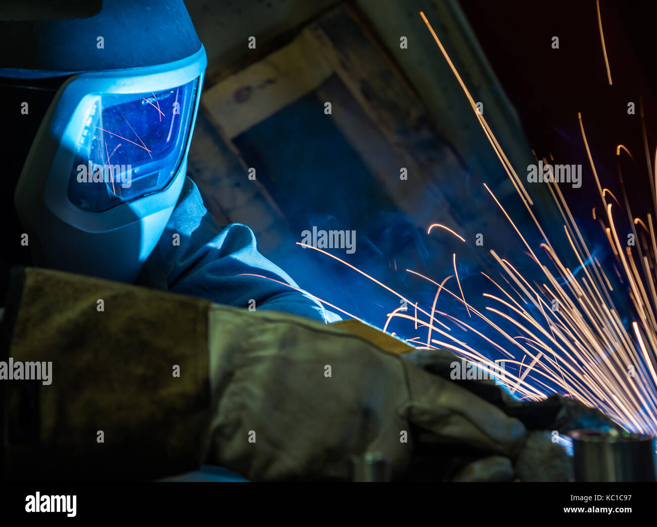 welder, craftsman, erecting technical steel Industrial steel welder in ...