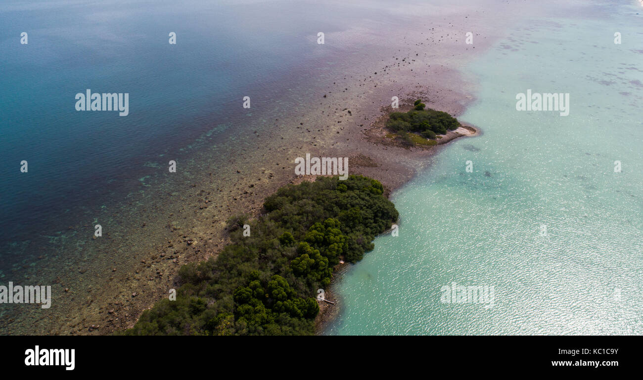 Aerial drone view of small green trees islands in blue sea water Stock ...