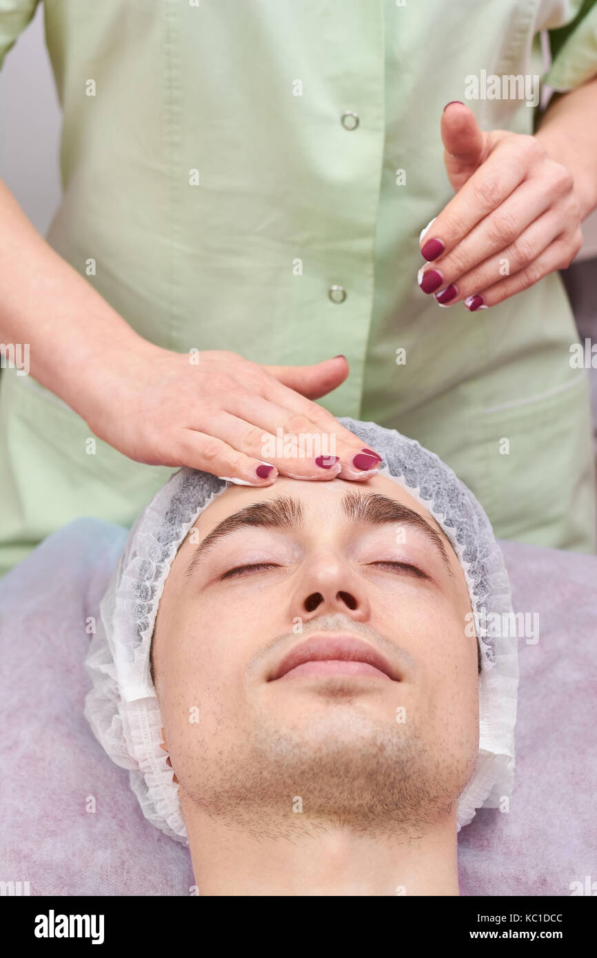 Applying lotion patient hi-res stock photography and images - Alamy