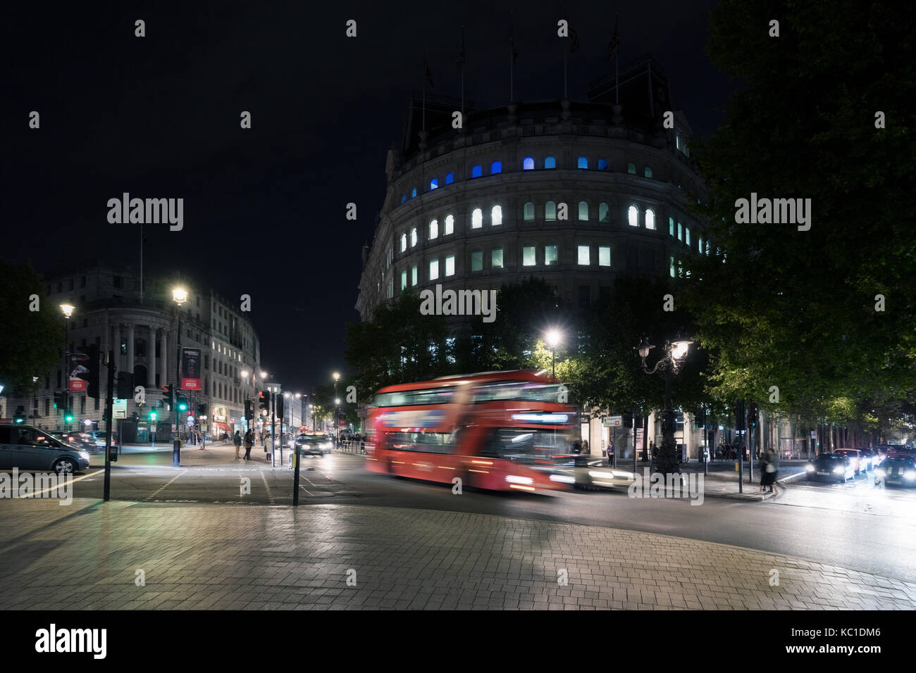 Busy London night scene with moving traffic Stock Photo - Alamy