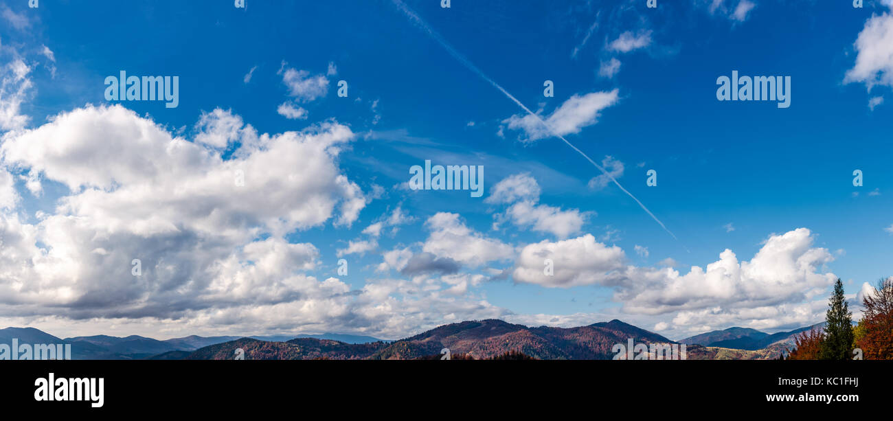 beautiful cloudscape over the mountain ridge. lovely nature background ...