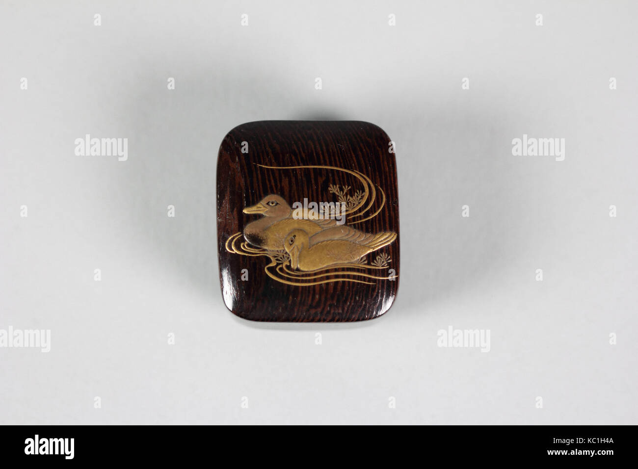 Netsuke of Two Ducks Swimming, 19th century, Japan, Wood, duck in gold ...
