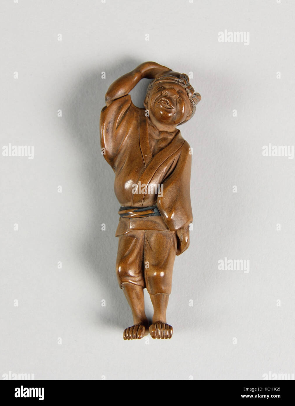 Netsuke of Drunken Man, late 19th century, Japan, Wood, H. 3 1/4 in. (8 ...
