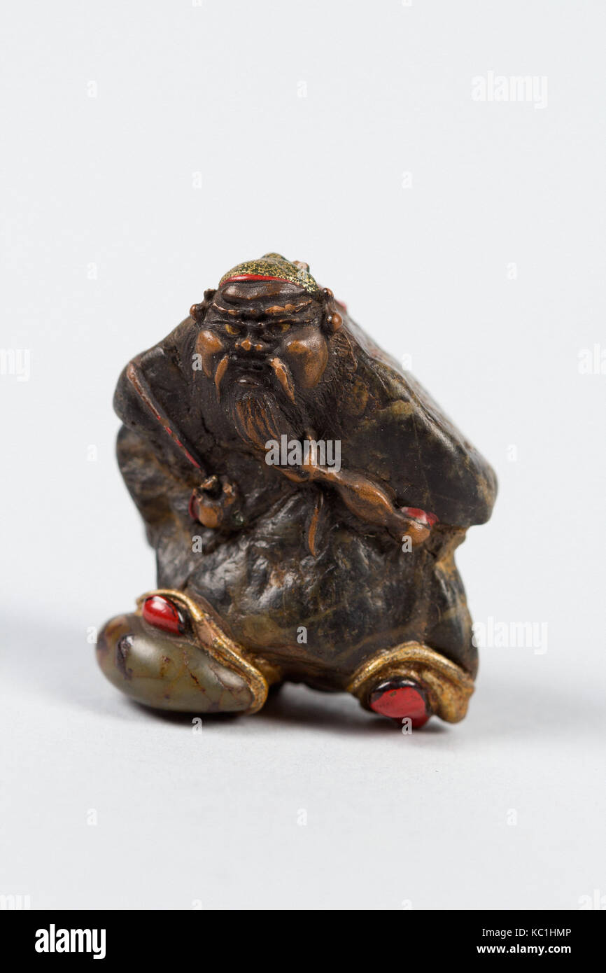 Netsuke, 19th century, Japan, Stone ornamented with gilt and red enamel ...