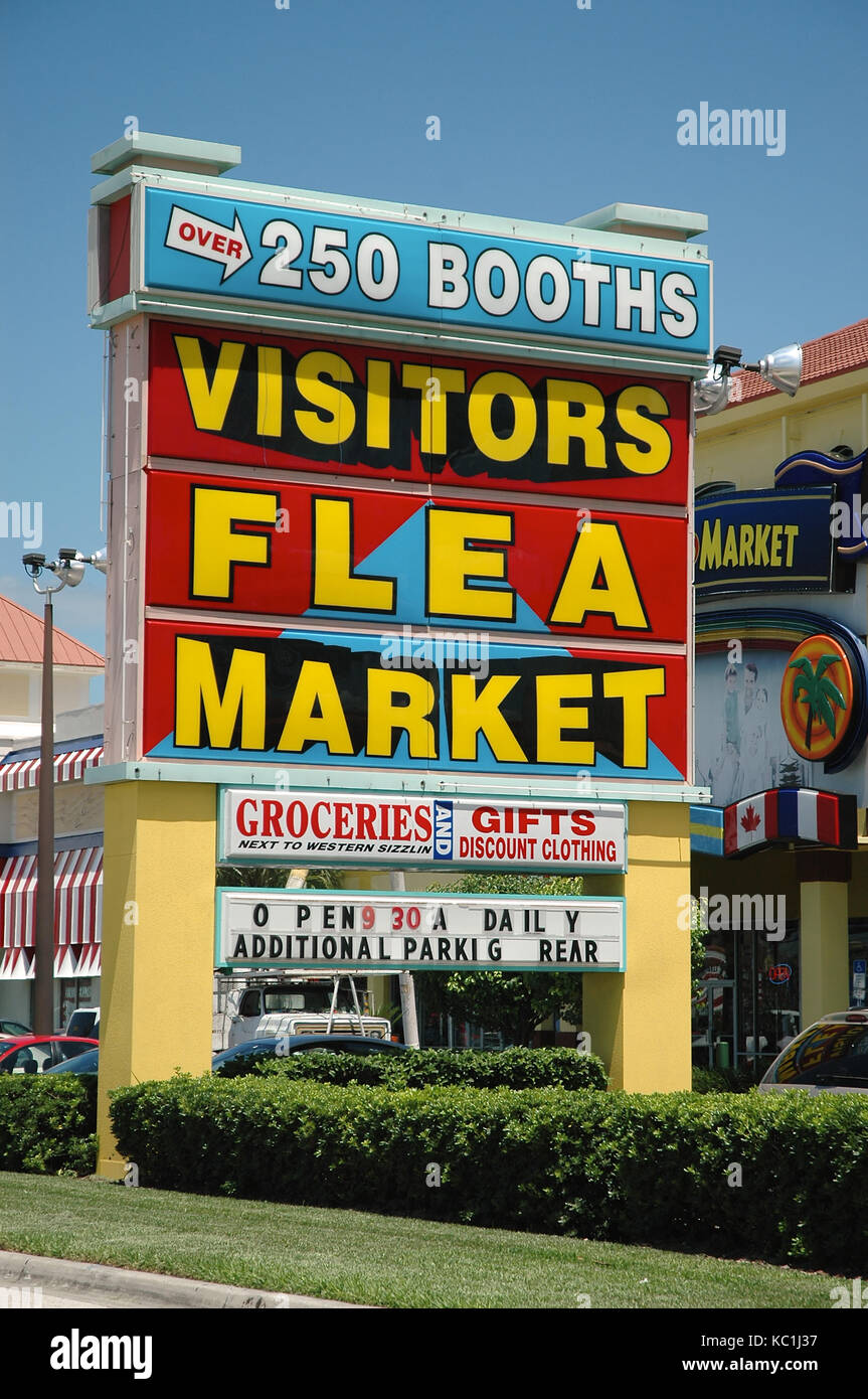 Flea market sign by the roadside Stock Photo - Alamy