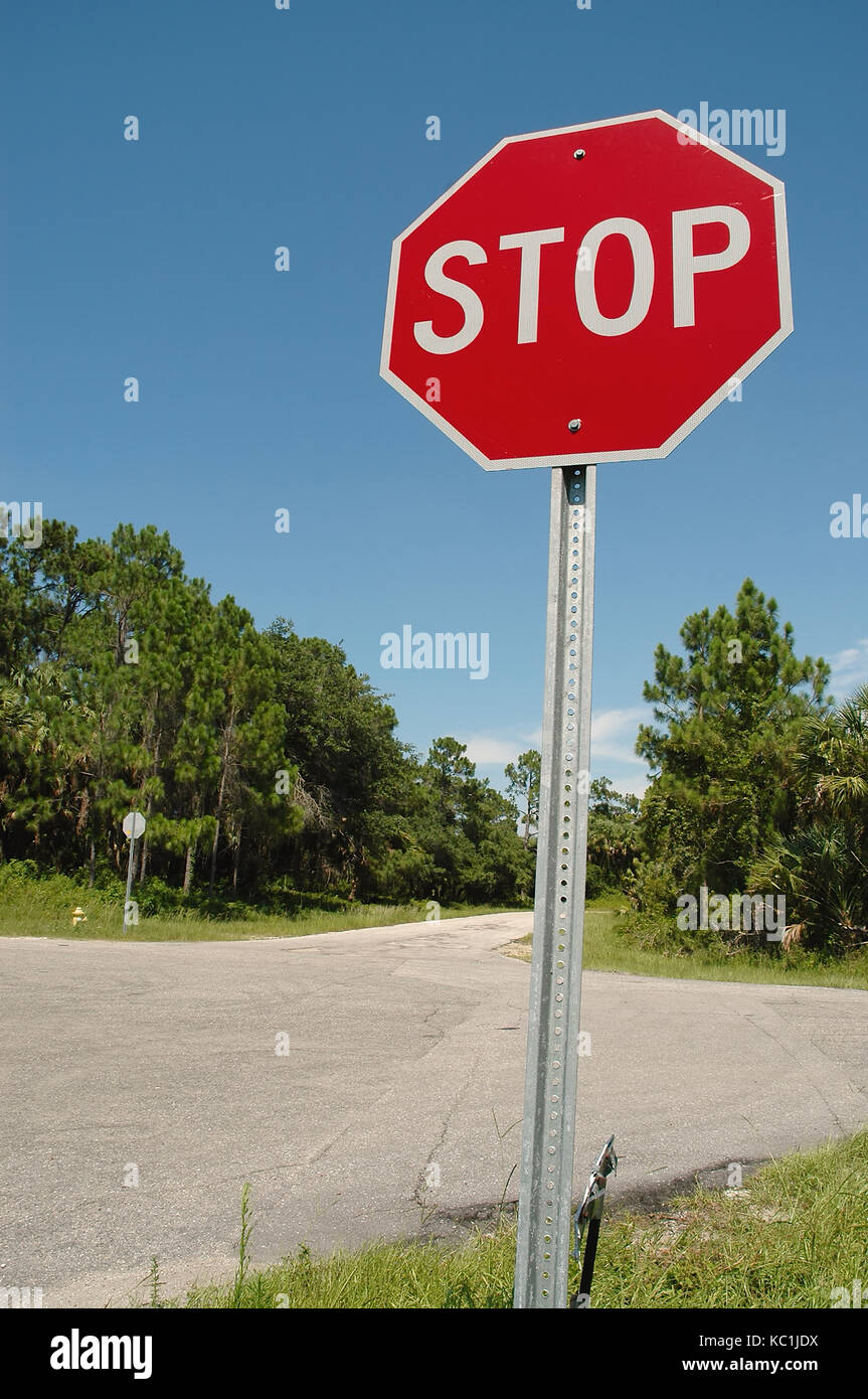 STOP sign by the roadside in Florida Stock Photo - Alamy