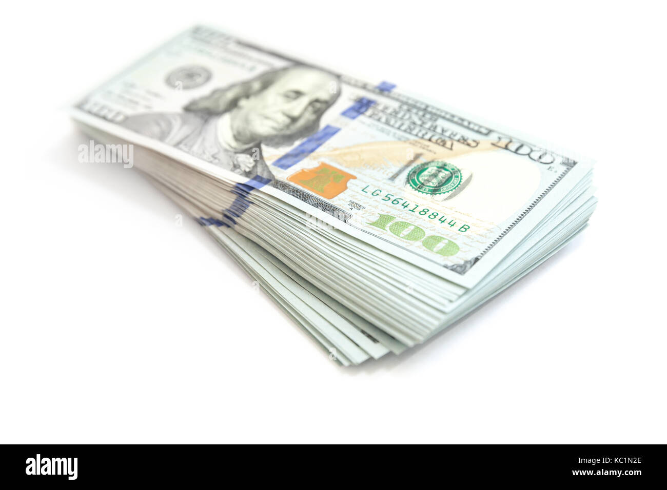 United States currency, bundle of One Hundred Dollars isolated on white ...