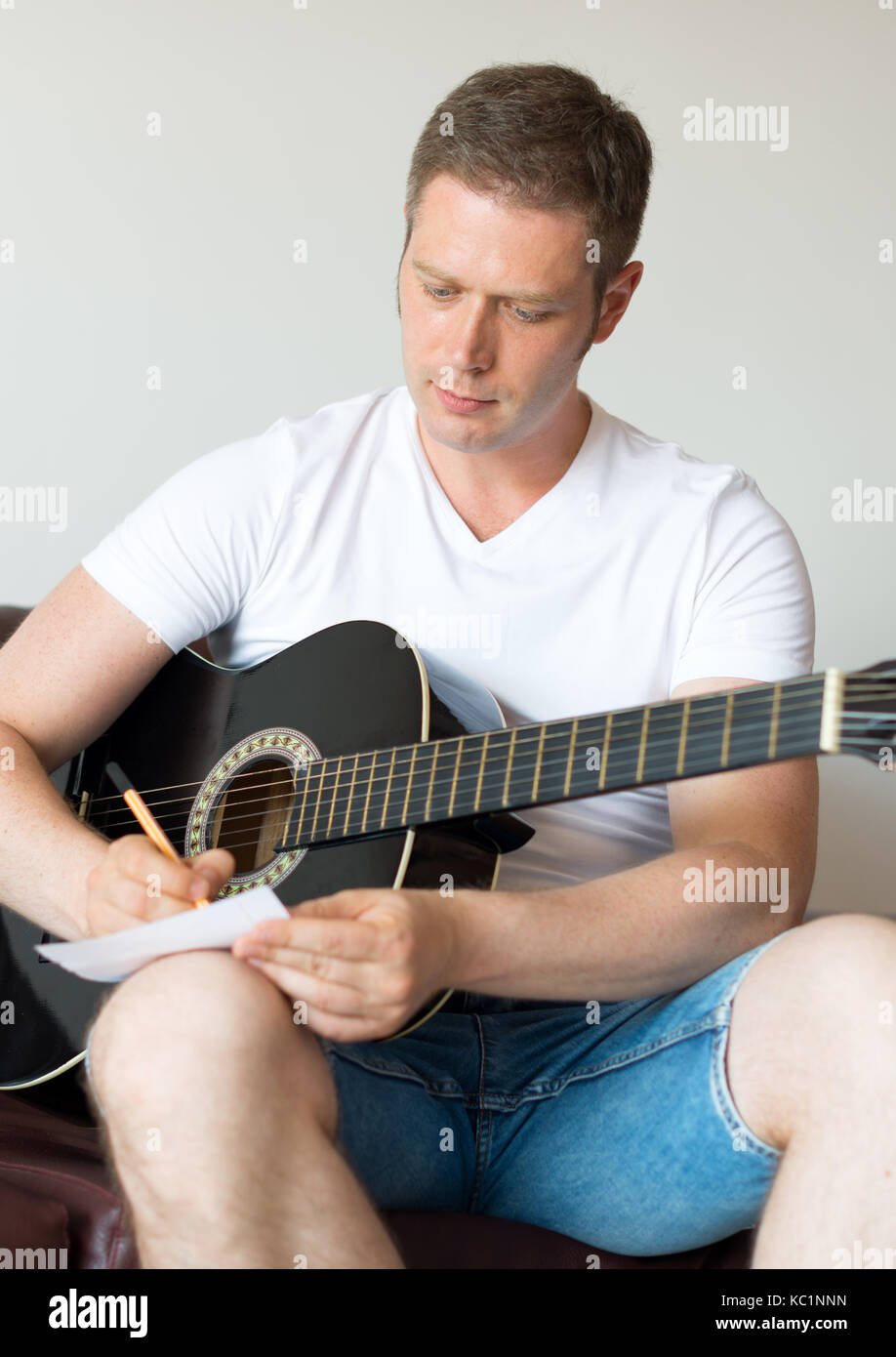 Music composer writing song home hi-res stock photography and images ...