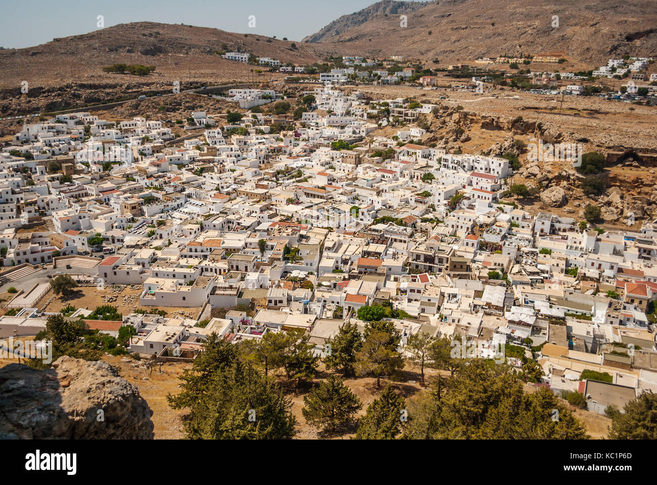 Lindos village during hot summer day, Rhodes Island, Greece Stock Photo ...