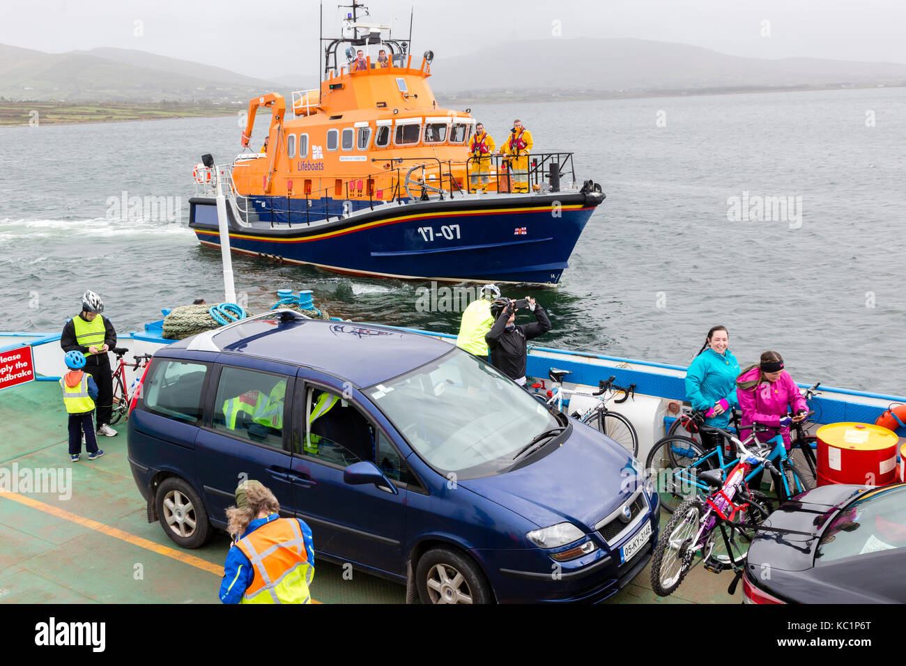 RNLI lifeboat, coming alongside the car ferry Valentia Island, County ...