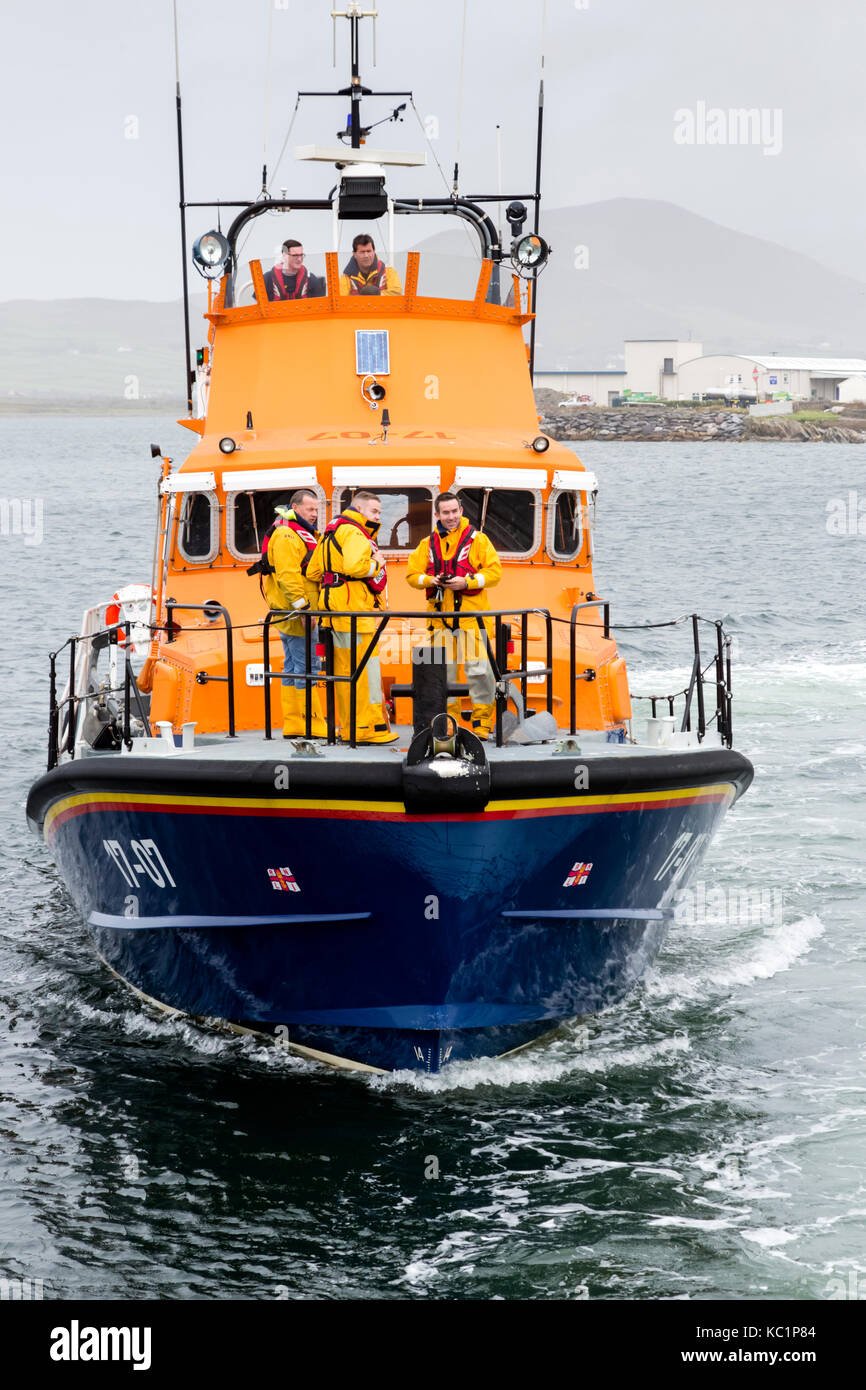 RNLI lifeboat, coming alongside the car ferry Valentia Island, County ...