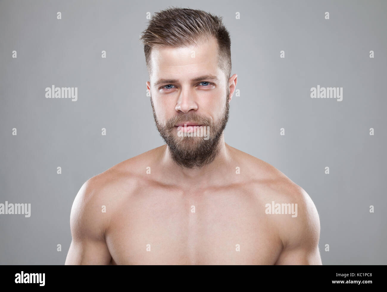 Portrait of young handsome bearded man with a new hair cut Stock Photo ...