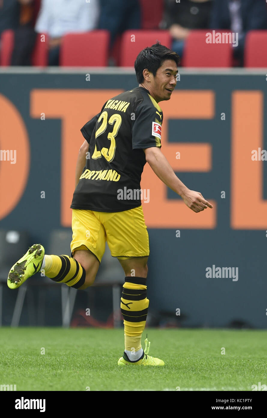 Augsburg, Germany. 30th Sep, 2017. Shinji Kagawa of Dortmund celebrates ...