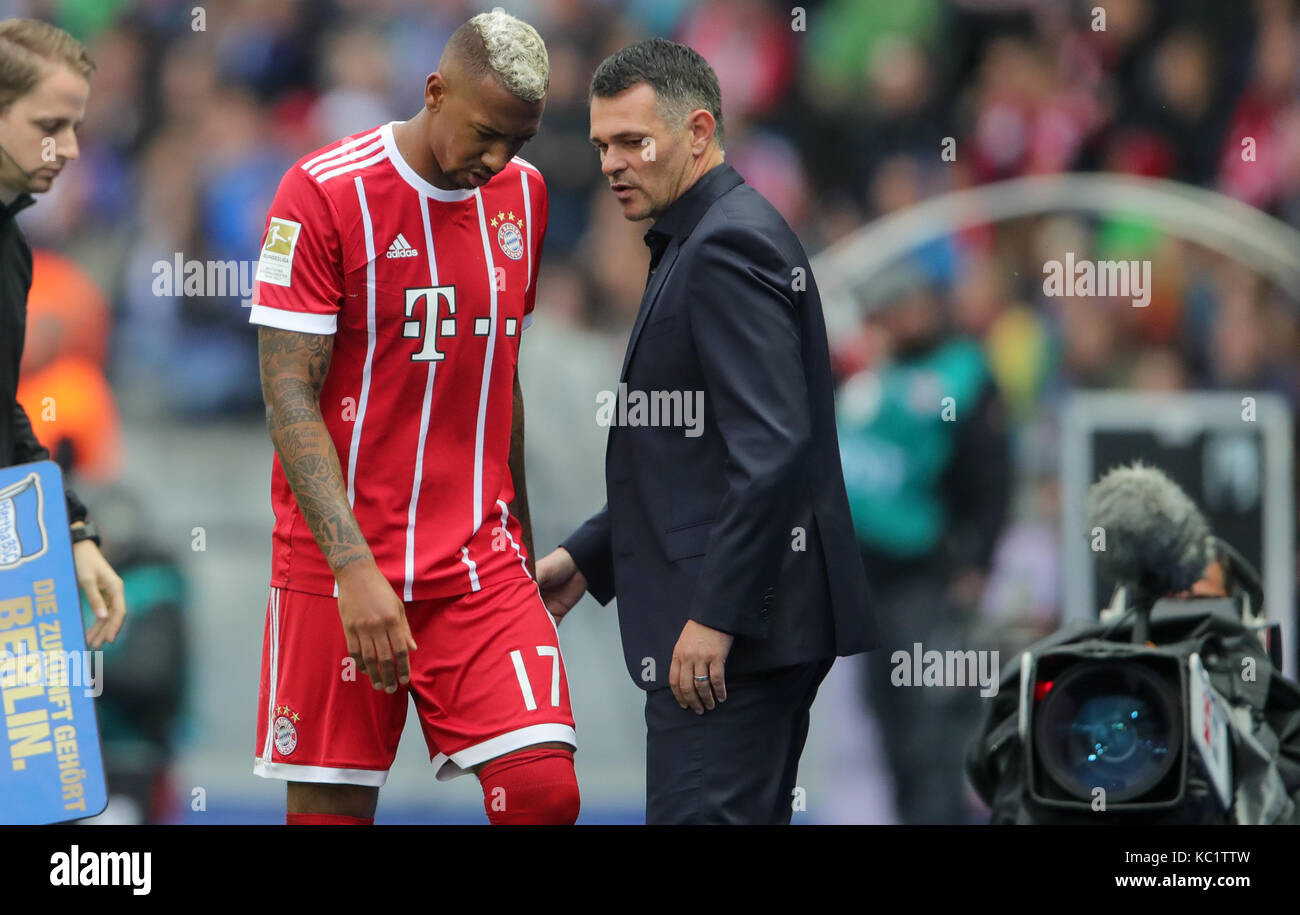 Berlin, Germany. 1st Oct, 2017. Bayern's Jerome Boateng (L) is switched ...