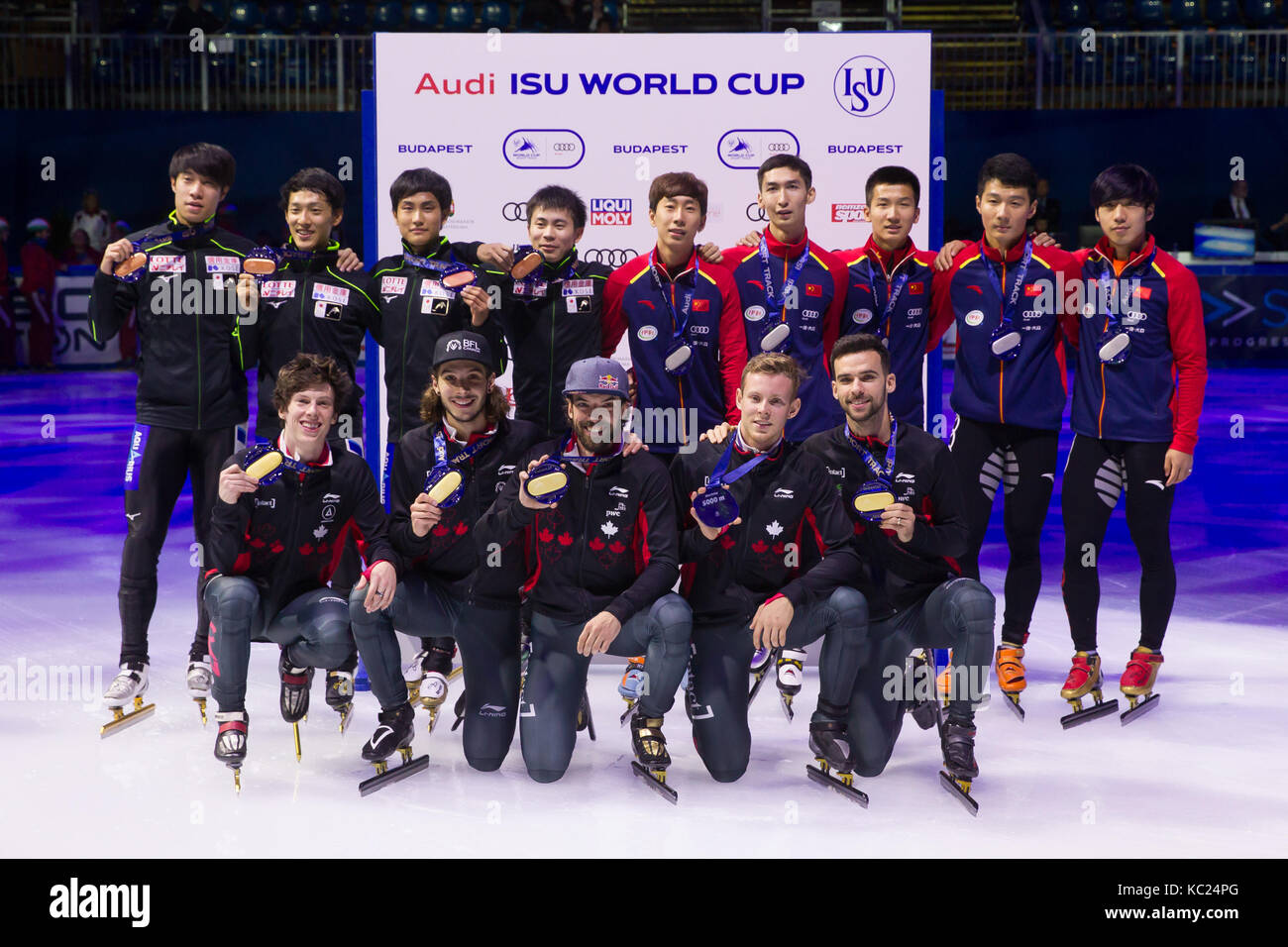 Budapest, Team China (Back R) and bronze medalists Team Japan take a ...