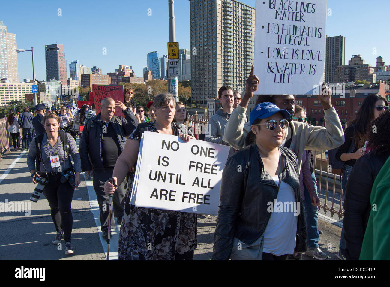 New York, USA. 01st Oct, 2017. Activists march across the Brooklyn ...