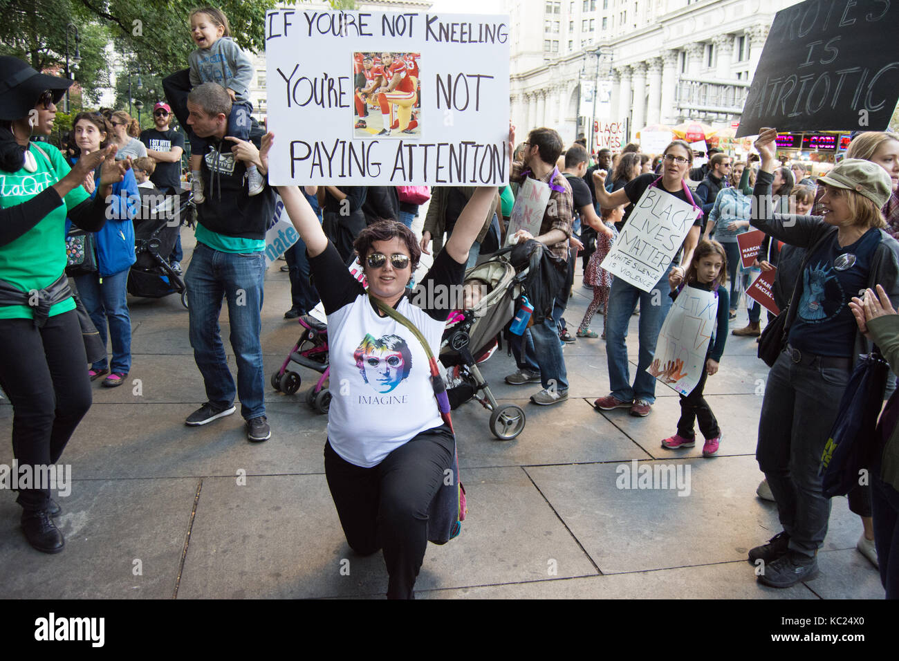 New York, USA. 01st Oct, 2017. Marchers assemble near City Hall after ...