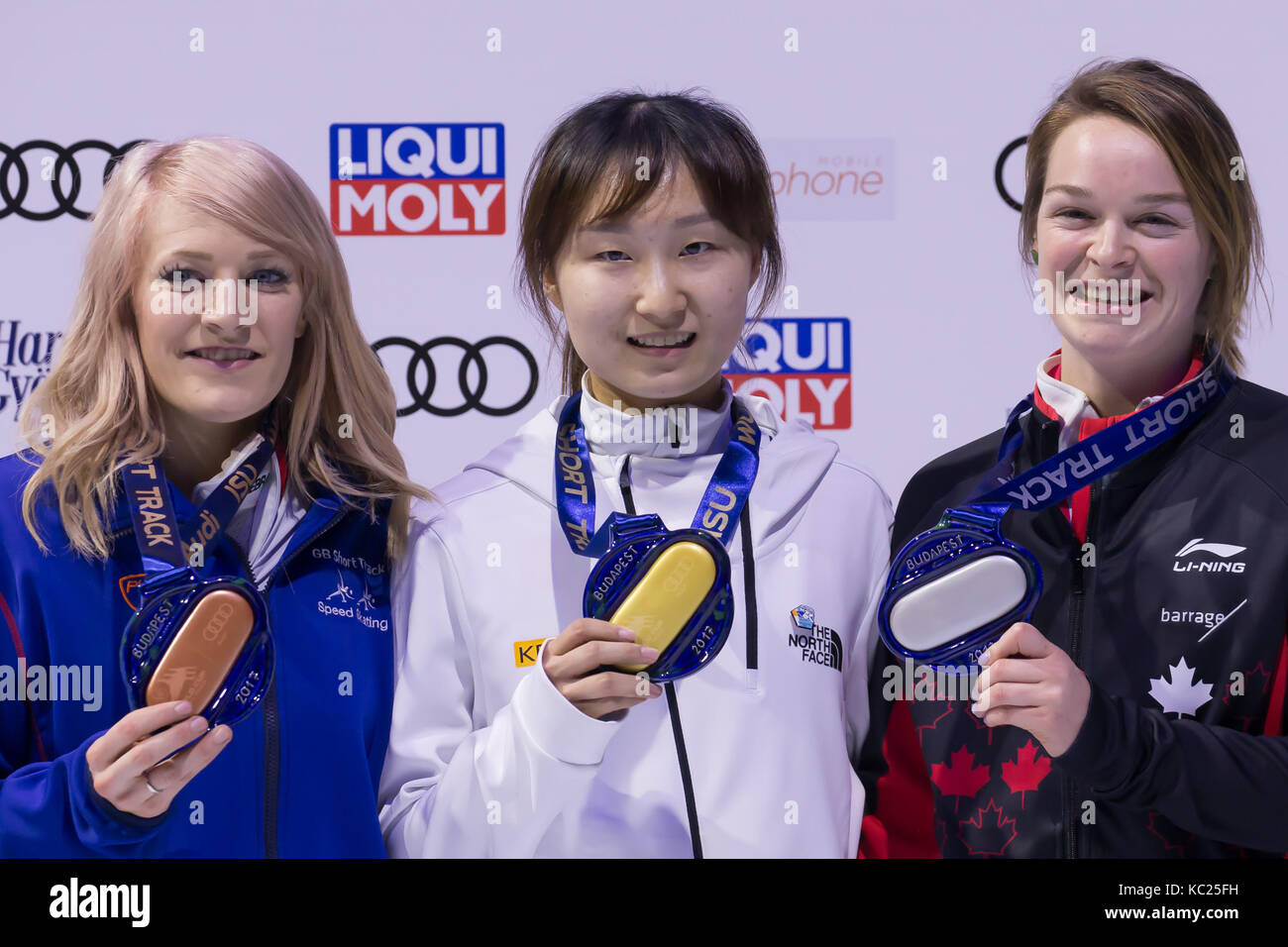 Budapest, Kim Boutin (R) of Canada and bronze medalist Elise Christie ...