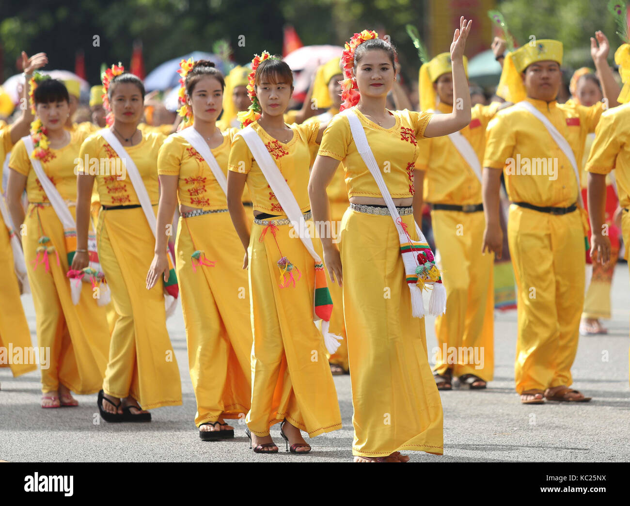 Ruili, China's Yunnan Province. 2nd Oct, 2017. People take part in the ...