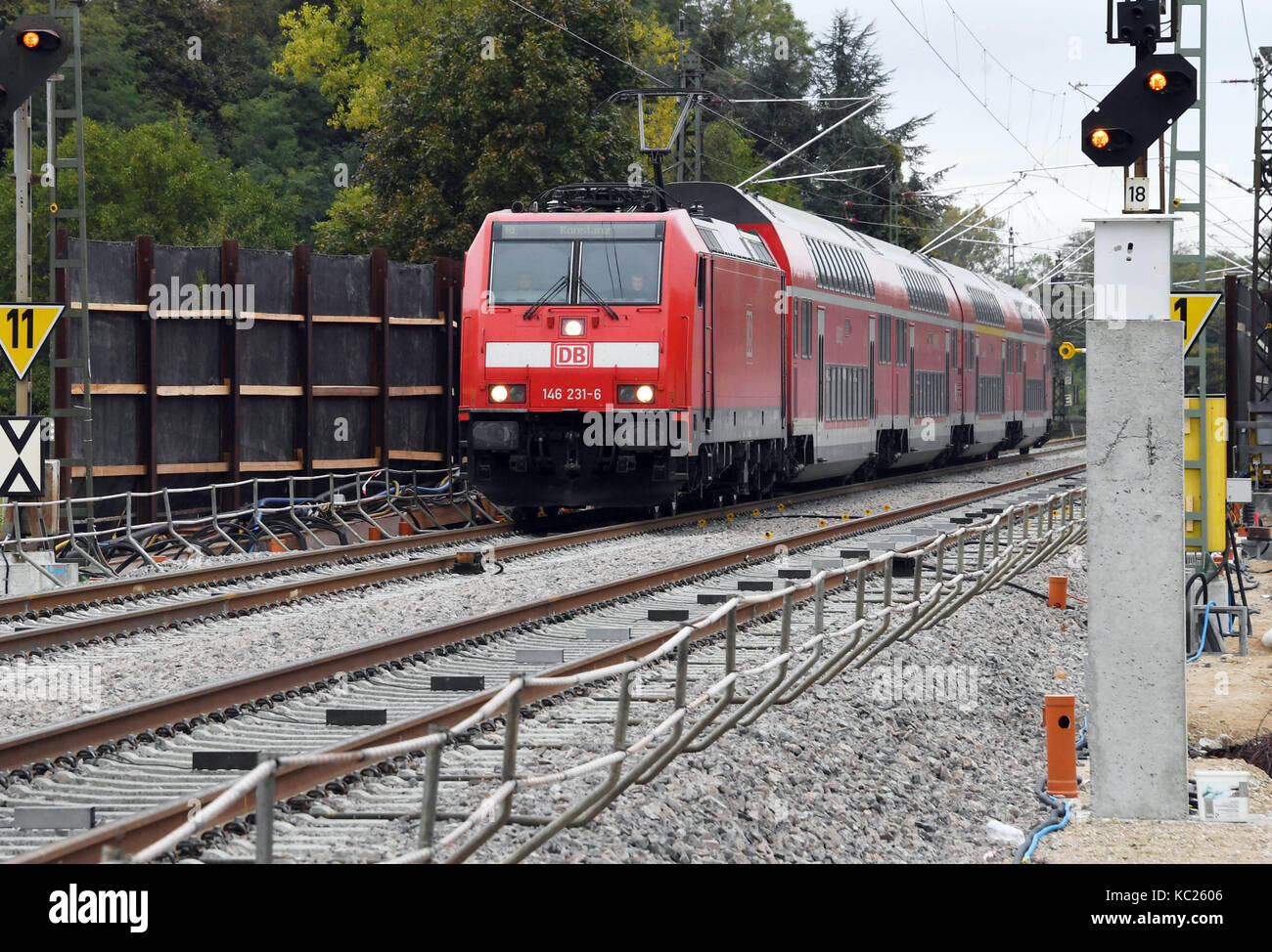 Niederbuehl, Germany. 2nd Oct, 2017. A train can be seen rushing by on ...